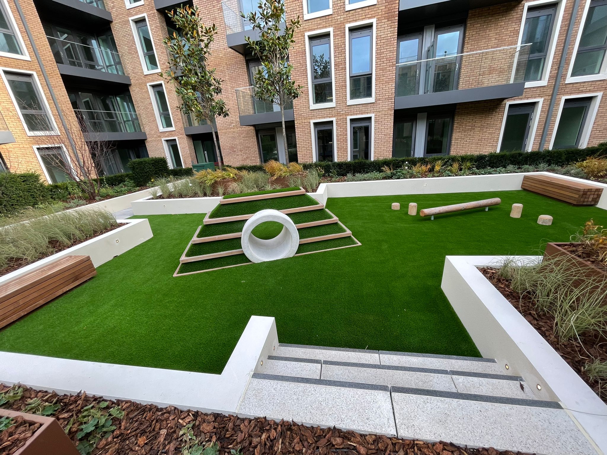 Fire-classified EverRoof artificial green roof play area in West London ...